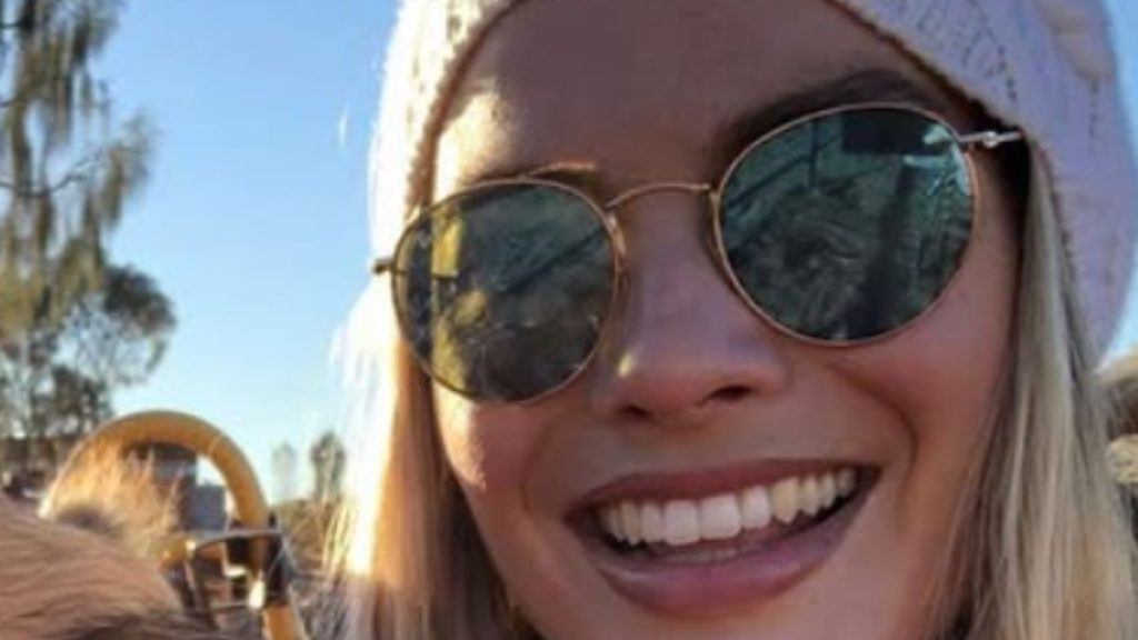 Margot Robbie’s Golden Corseted Look Is a Timeless Throwback Worth ...